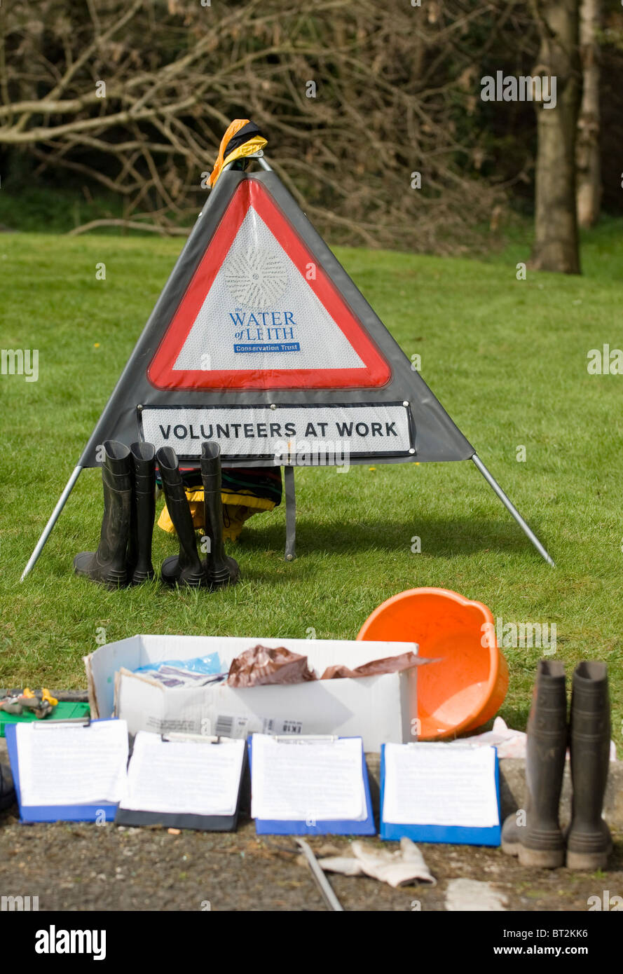 "volunteers at work" sign and tools at periodical clean-up of the Water ...
