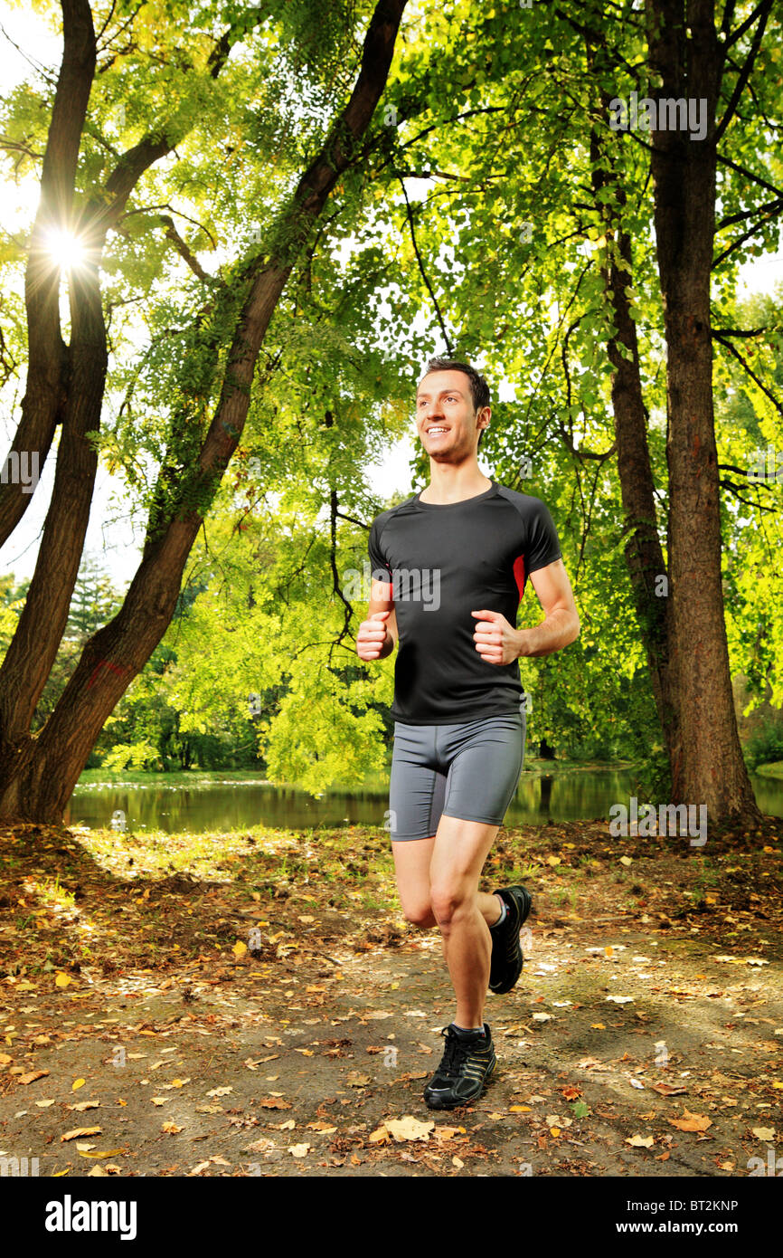 Man running on trail park hi-res stock photography and images - Alamy