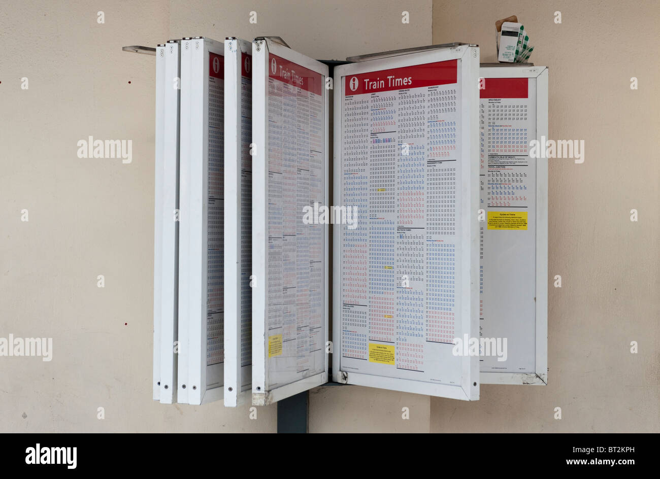train timetables on an information stand in Waterloo Station, London ...