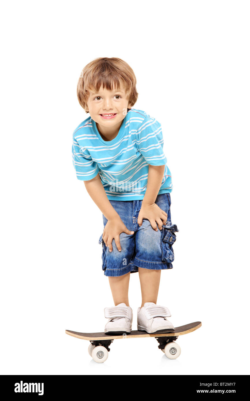 Full length portrait of an adorable young boy riding a skateboard Stock ...