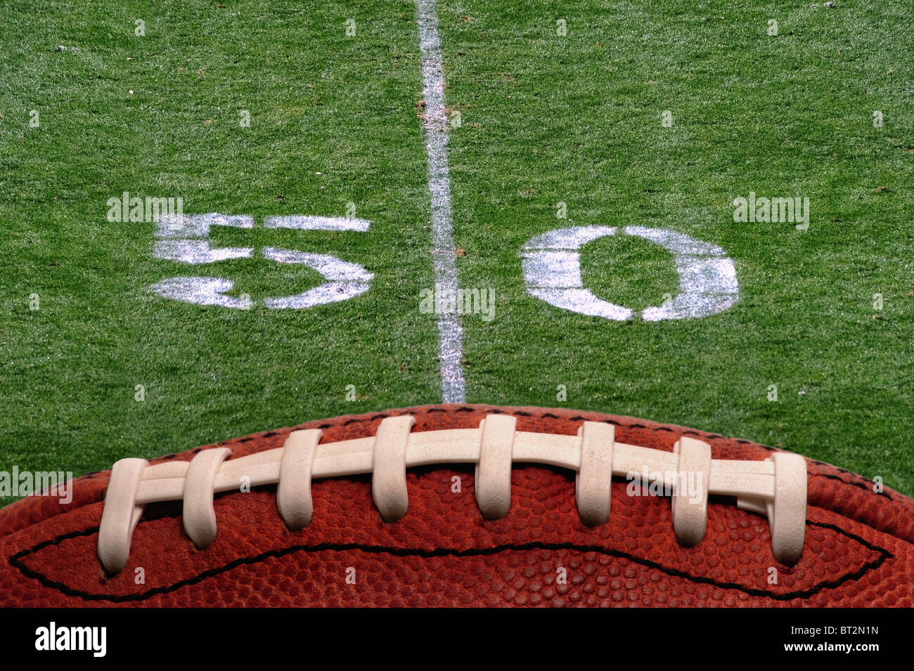 American football fifty yard line Stock Photo - Alamy