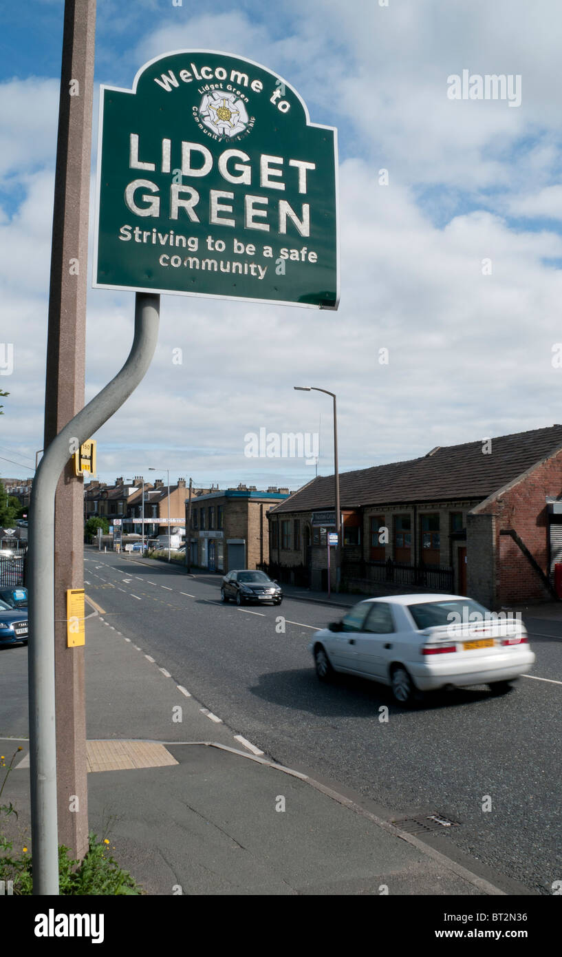 Sign which says 'Lidget Green striving to be a safe community ...