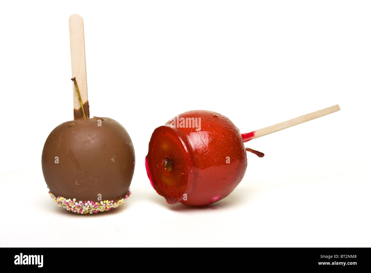 Toffee and chocolate coated apples from low perspective isolated on ...