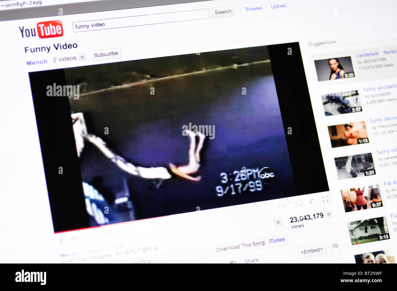 YouTube website showing man falling off of water slide Stock Photo - Alamy