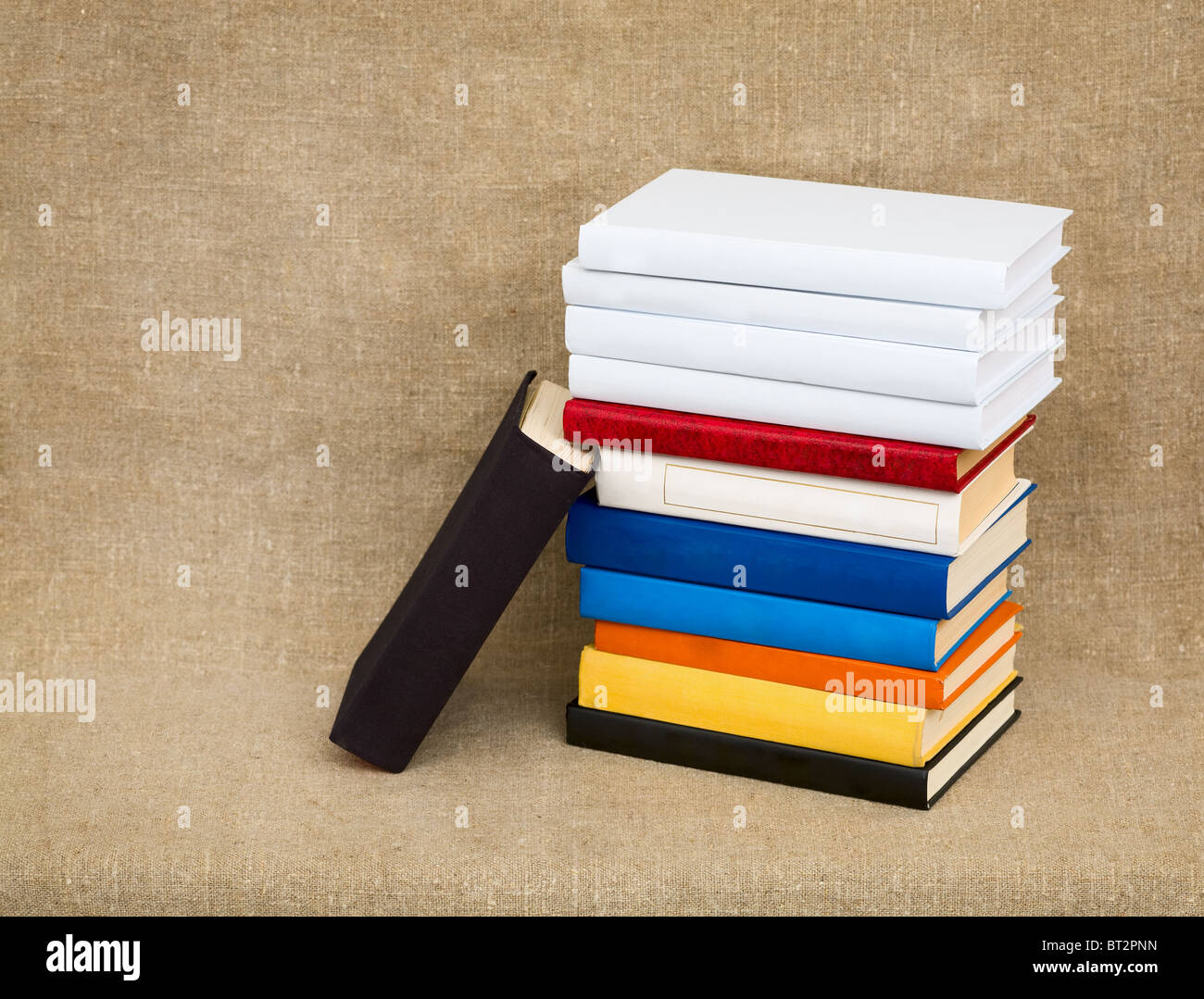 Multicolor books on the canvas background Stock Photo - Alamy