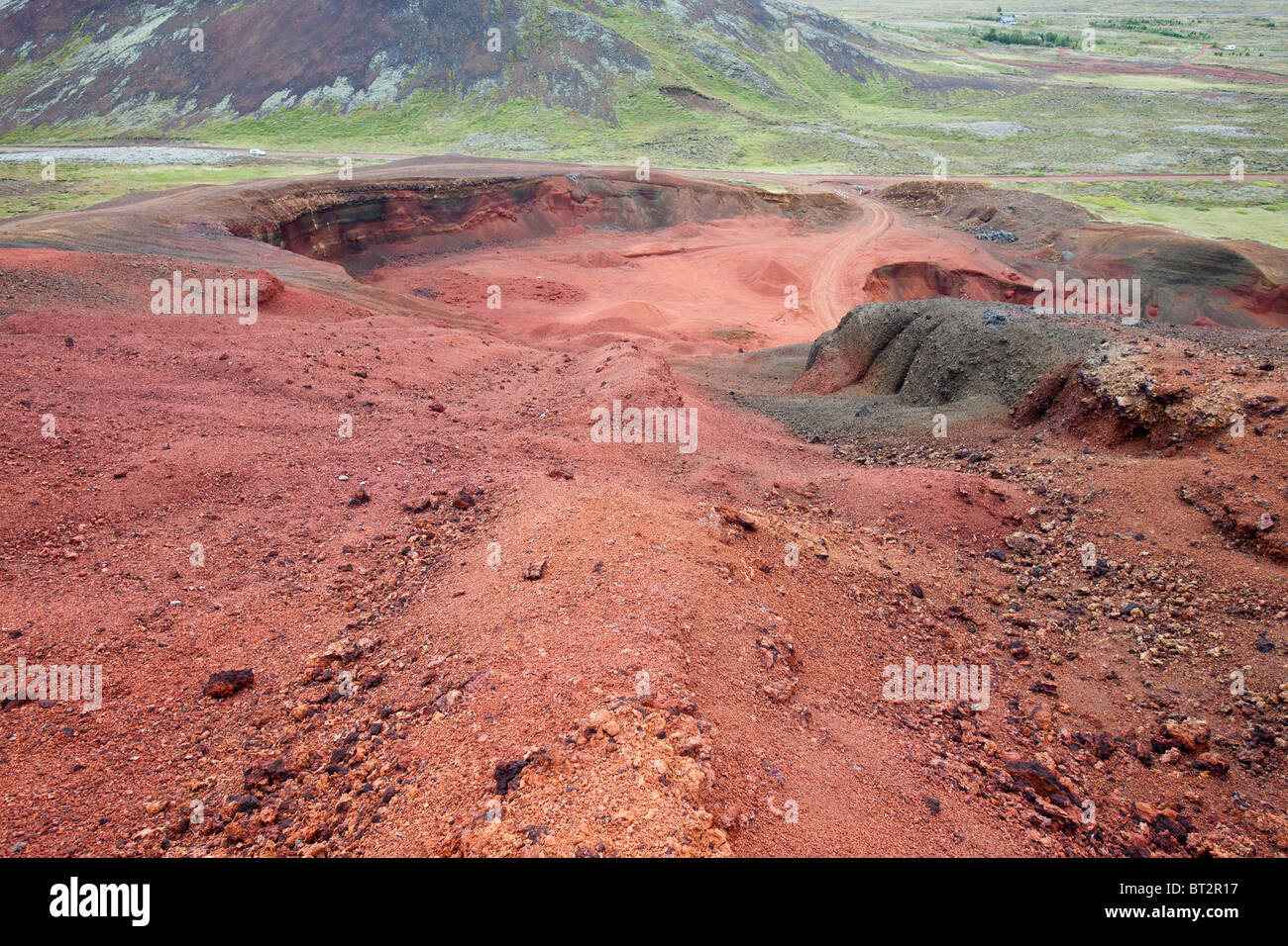 Excavating volcanic Scoria rock from the Seydisholar cone for road ...