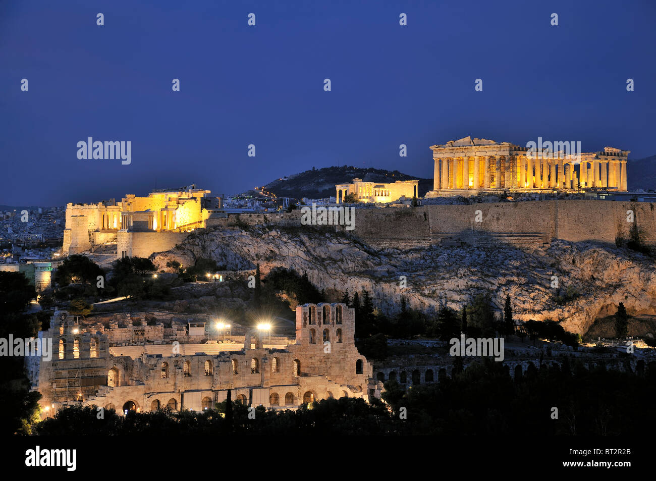 Acropolis of Athens and theater of Herodus Atticus during dusk time ...