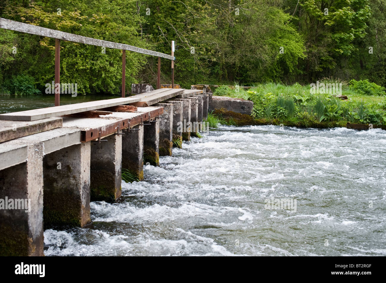 A bridge over the River Test in Hampshire. The River Test is a chalk ...