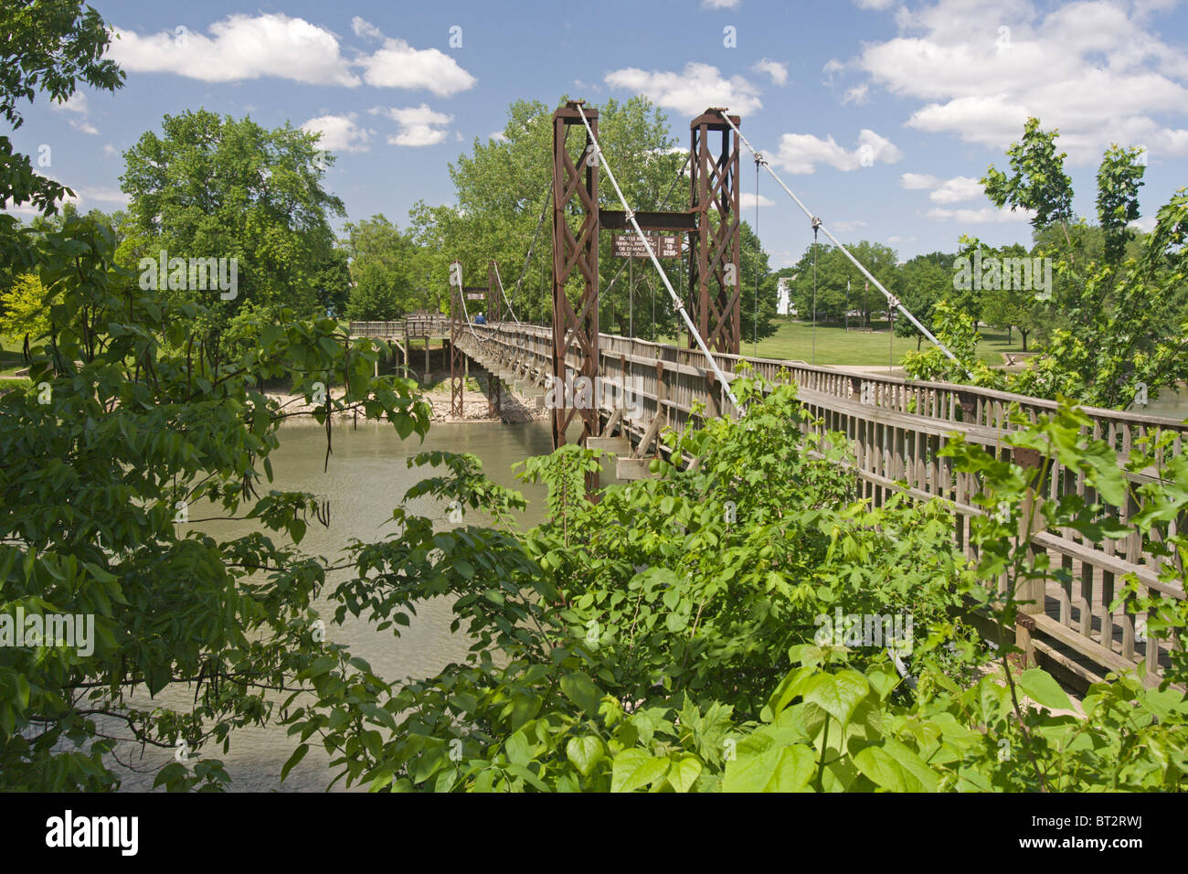 One of three swinging wooden bridges over the Vermilion River in ...
