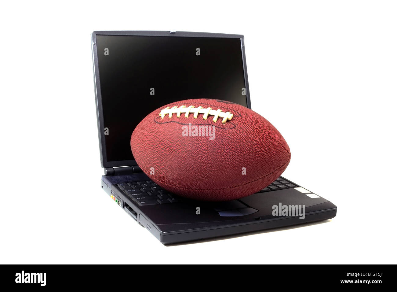 Football and the laptop computer Stock Photo - Alamy