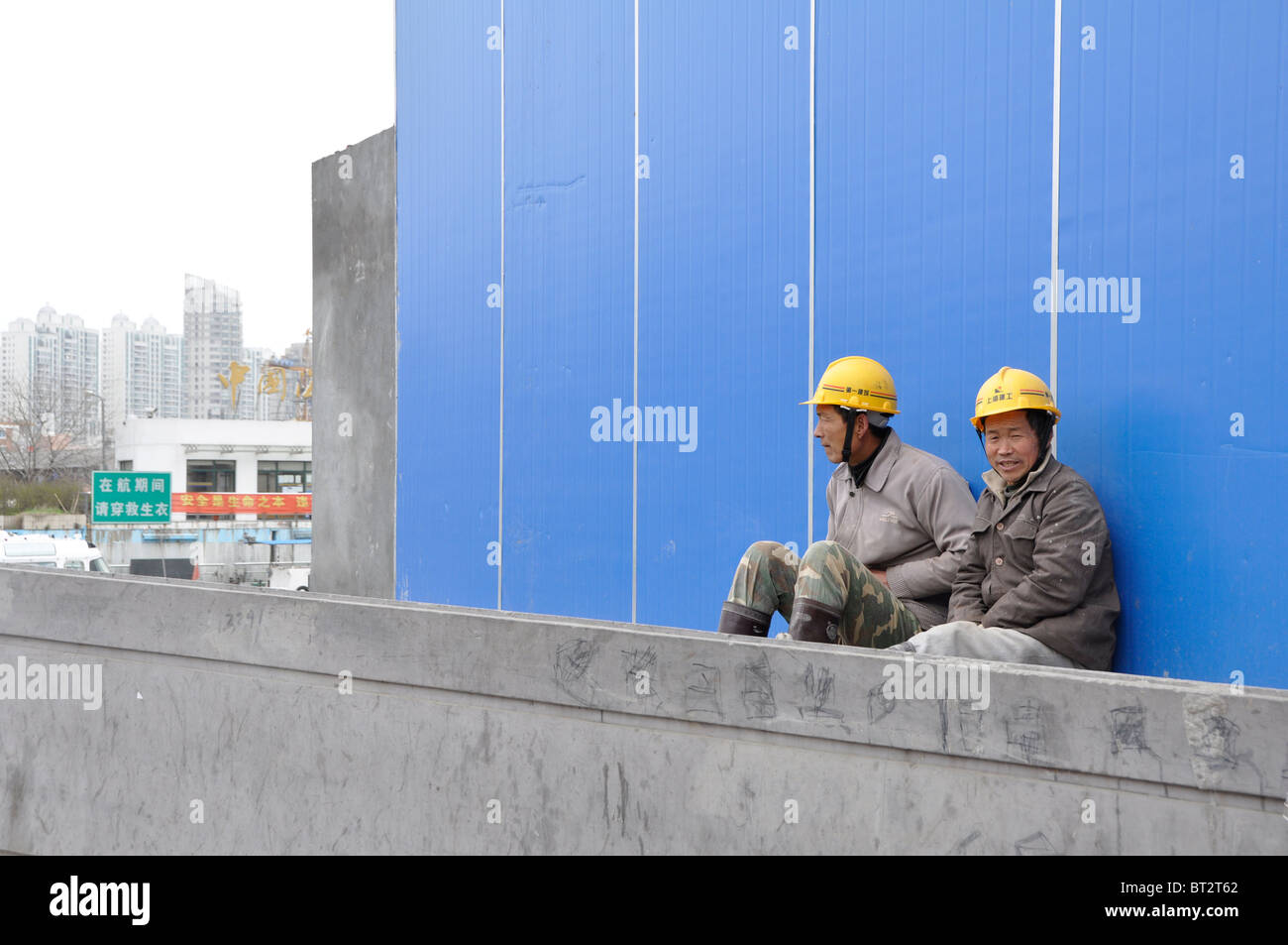 Two Migrant Construction Workers in Shanghai China Stock Photo - Alamy