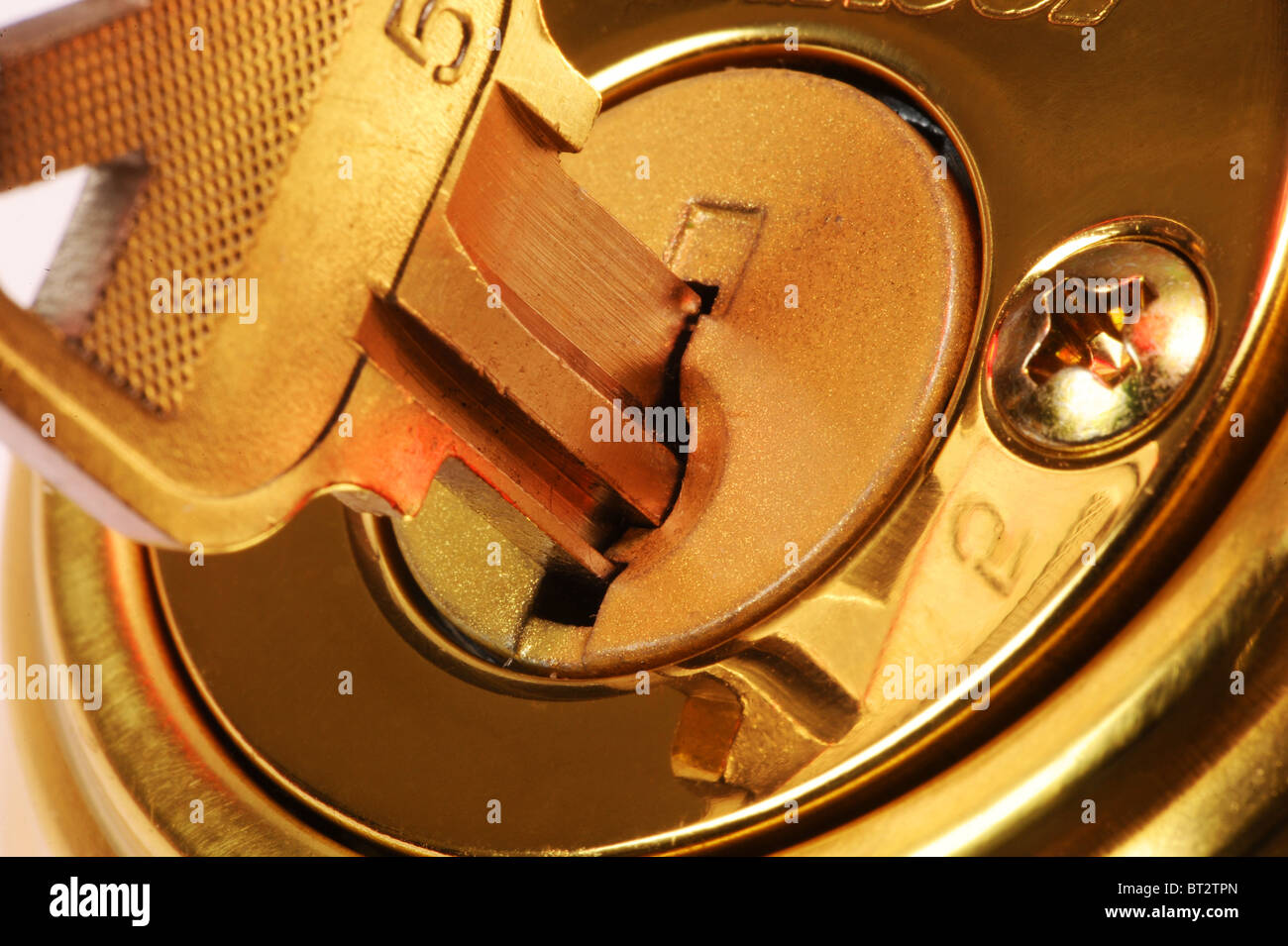 Close up of key and lock Stock Photo - Alamy