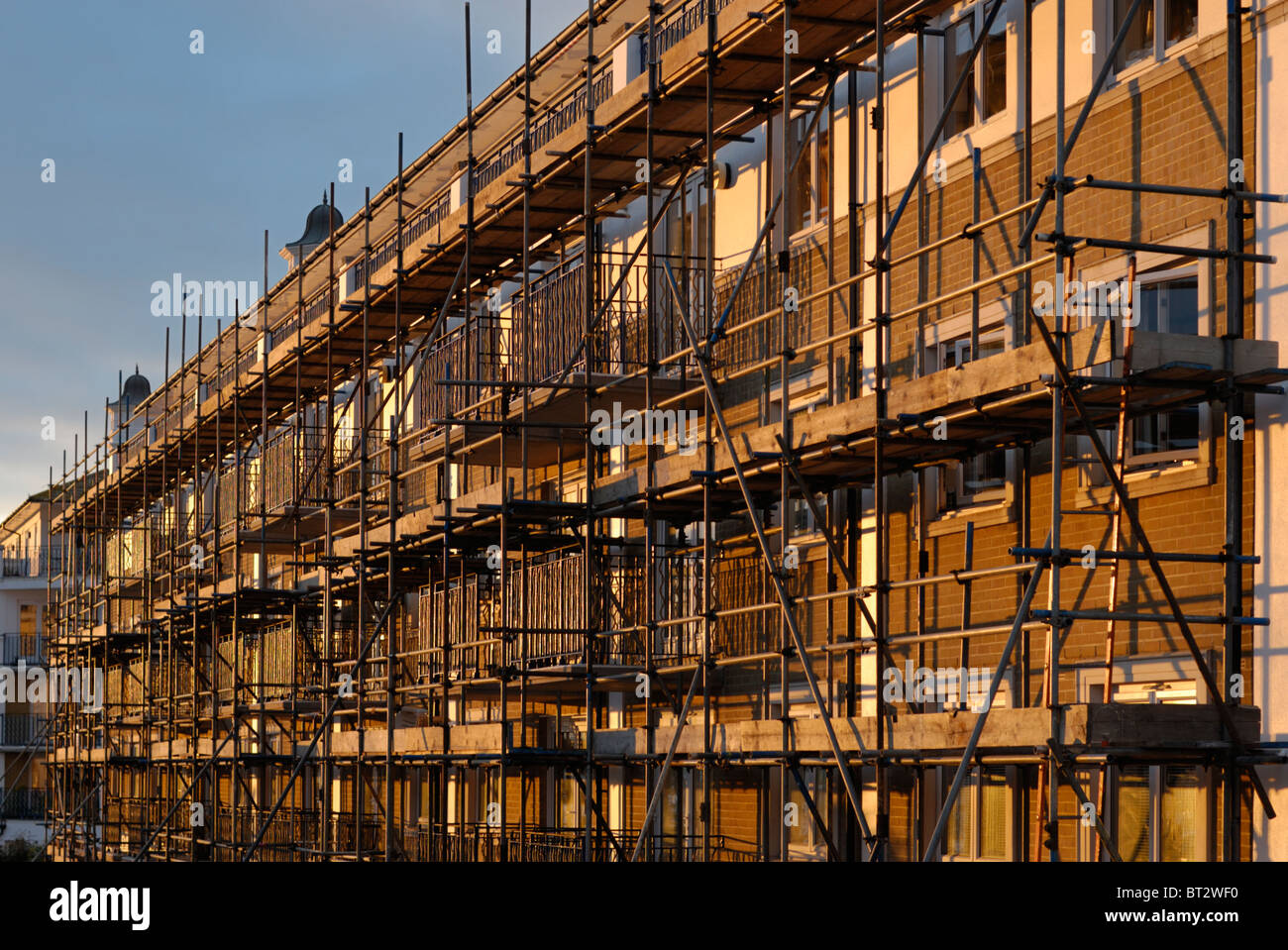 Scaffolding covering the side of a building Stock Photo - Alamy