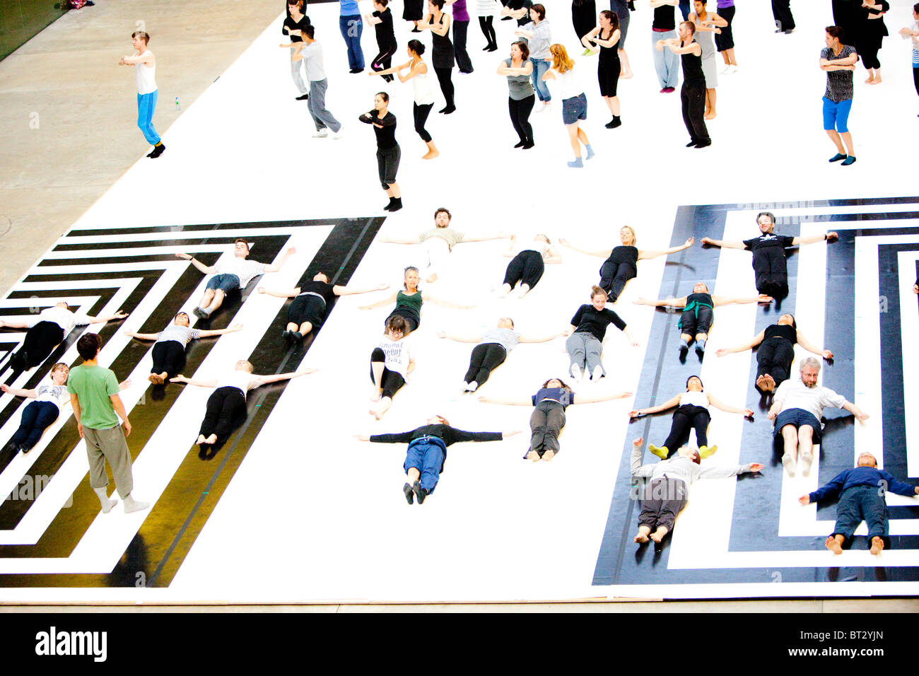 Elevated view of a group dancers rehearsing choreography Stock Photo ...