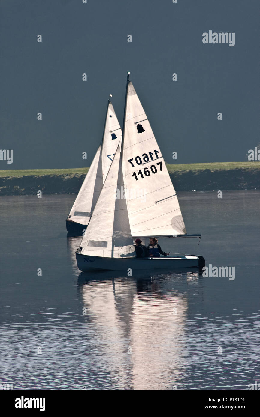 Small sailing dinghies on a reservoir Stock Photo - Alamy