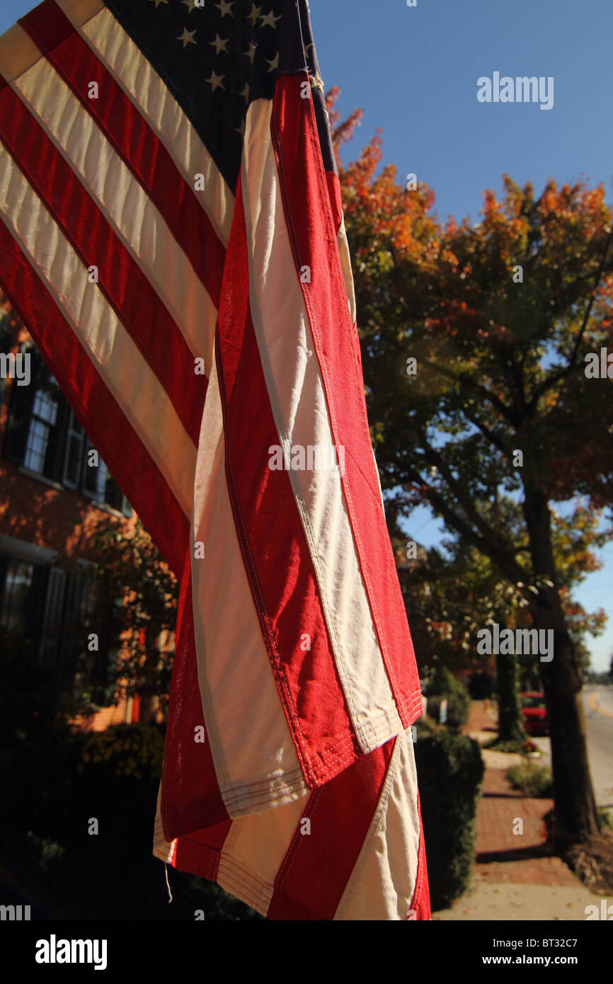 A view of a US flag in a rural fall setting Stock Photo - Alamy