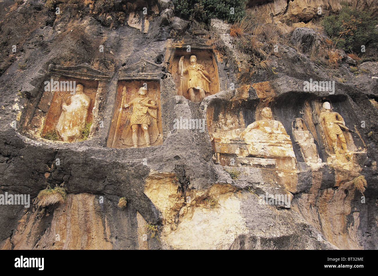 Man sculptures on a rock Adamkayalar Erdemli Mersin Turkey Stock Photo ...