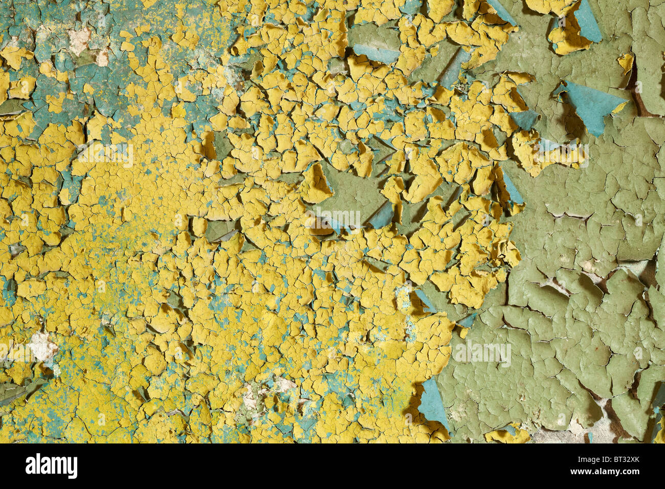 Old damaged yellow paint on a concrete wall background Stock Photo - Alamy