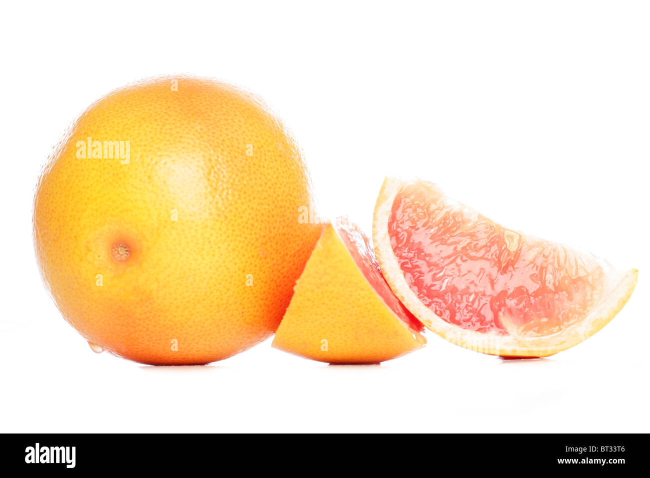 Pink grapefruit isolated studio cutout Stock Photo - Alamy