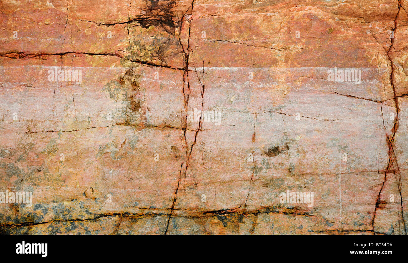 The cracked surface of a rock on seacoast Stock Photo - Alamy