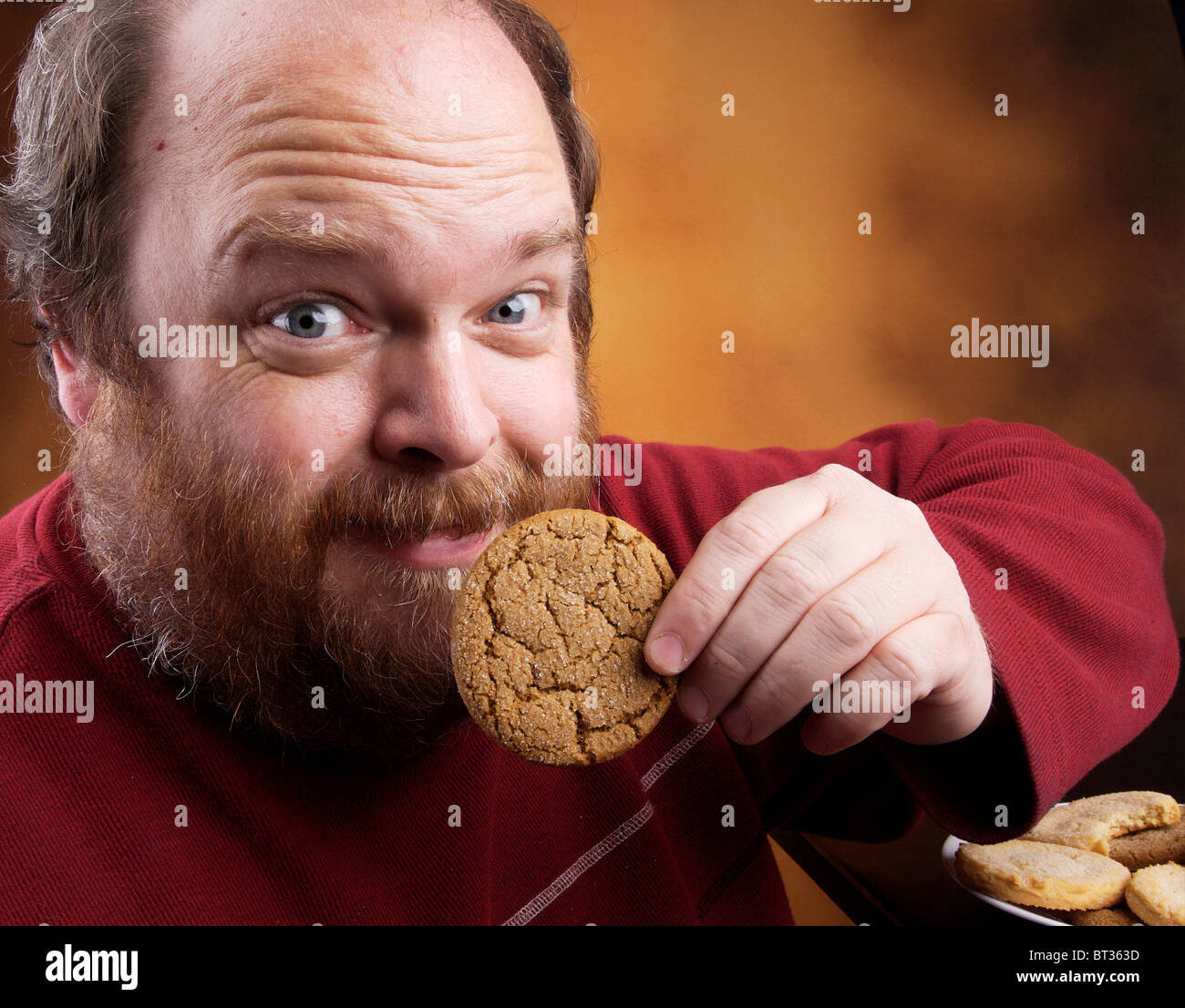 Man cookie overweight hi-res stock photography and images - Alamy