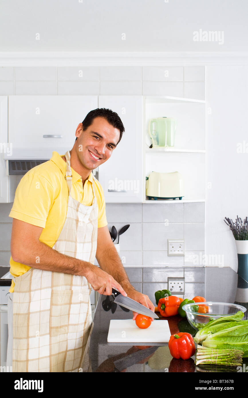 young man cooking in kitchen Stock Photo - Alamy