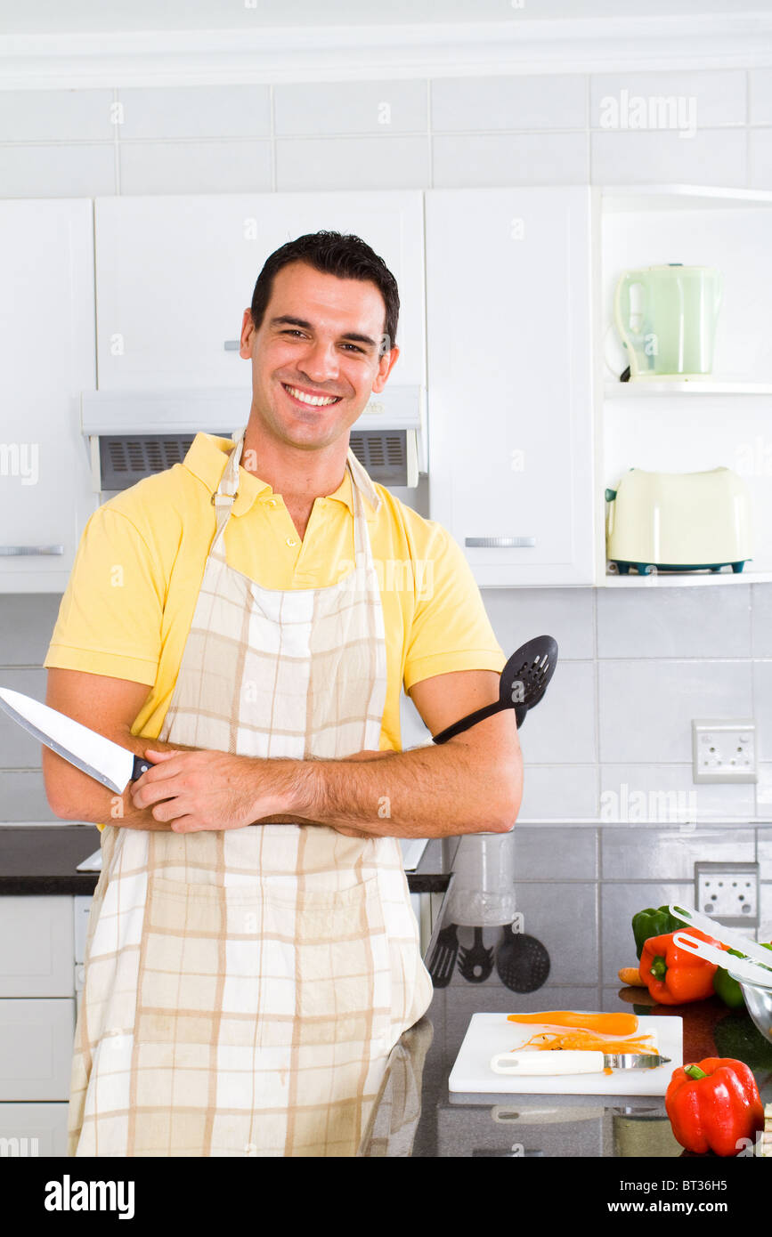 young happy man in a modern kitchen Stock Photo - Alamy