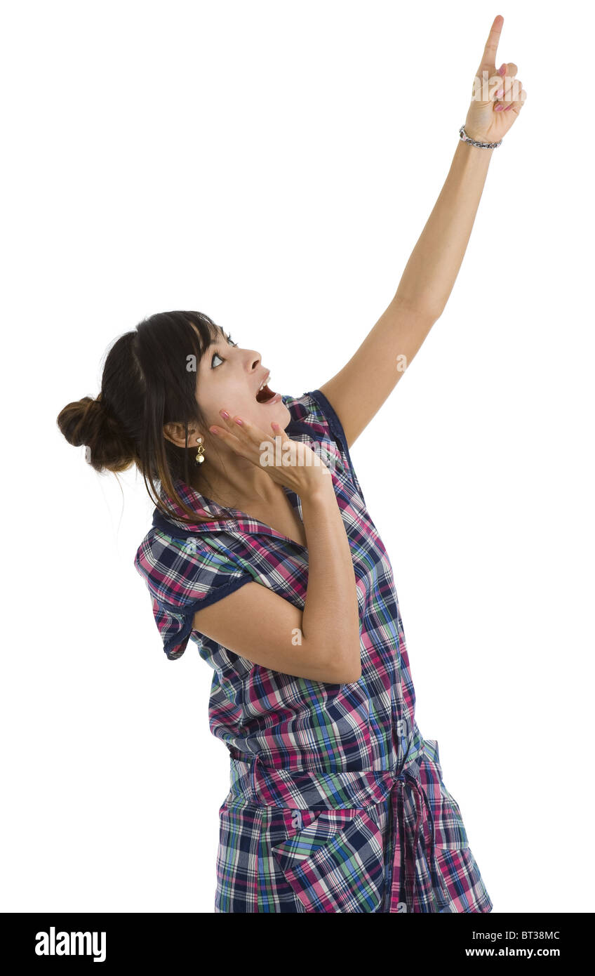 shocked beautiful woman pointing up at something, isolated on white ...