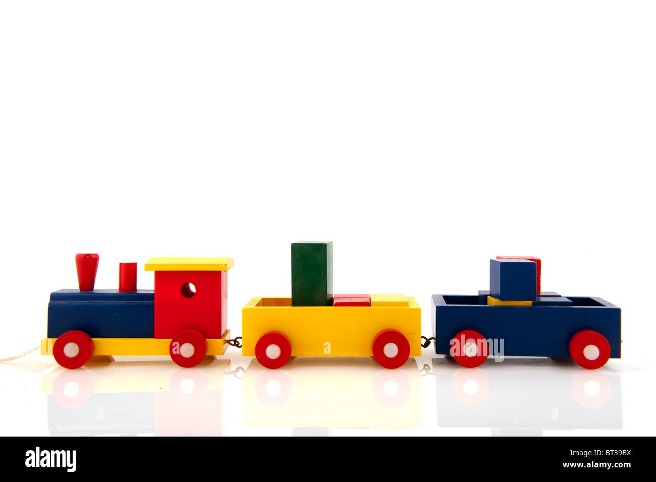 Wooden toy train with colorful blocks locomotive and wagons Stock Photo ...