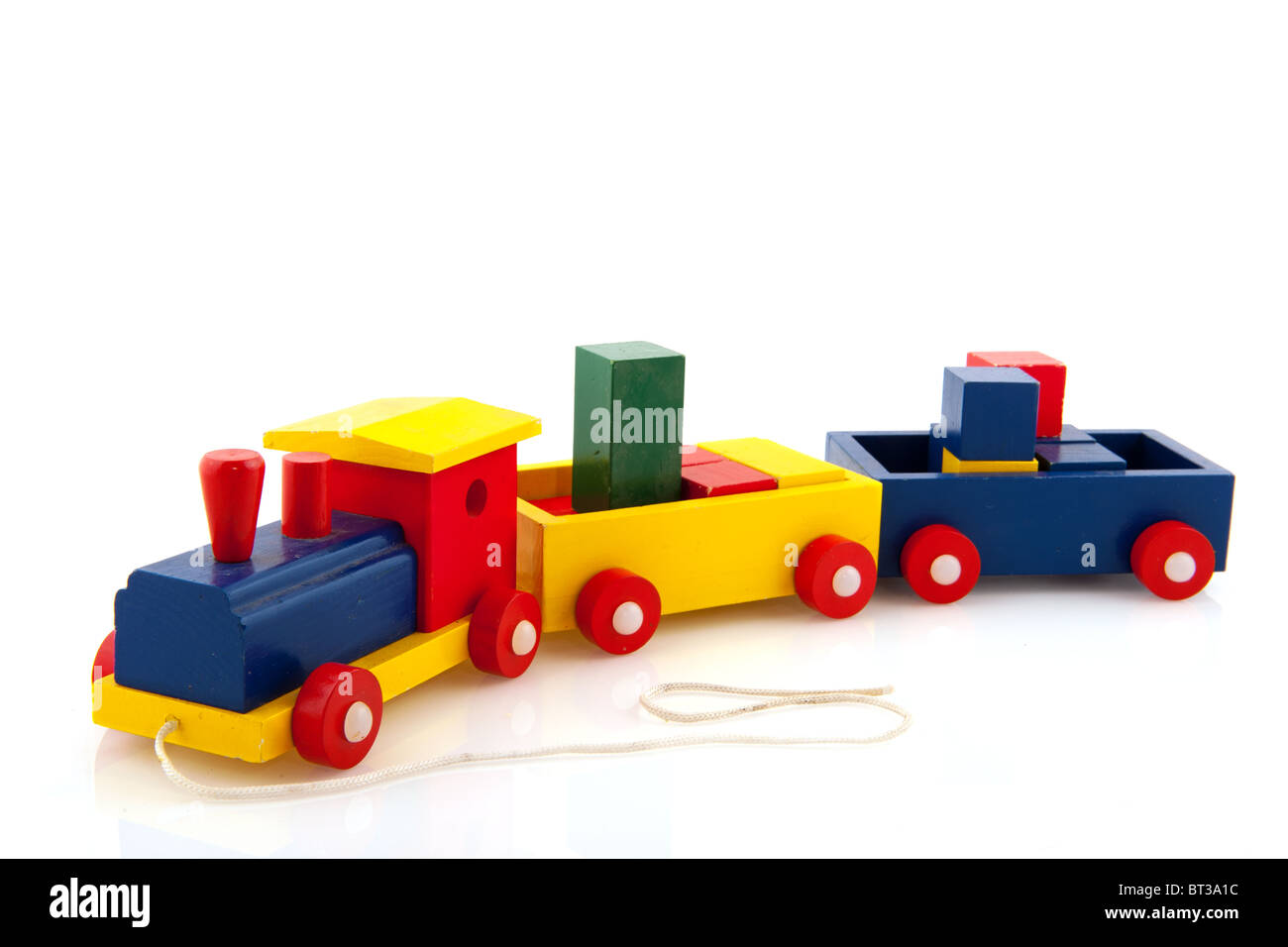 Wooden toy train with colorful blocks locomotive and wagons Stock Photo ...