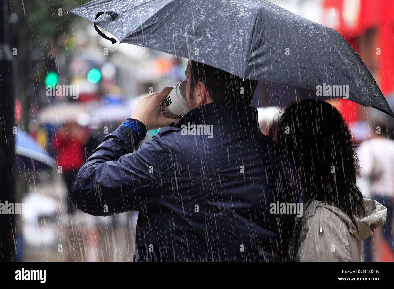 Shoppers on a cold and rainy day Stock Photo - Alamy