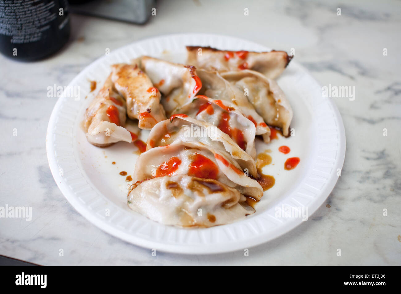 A plate of Chinese pork and chive dumplings at Prosperity Dumpling, in ...