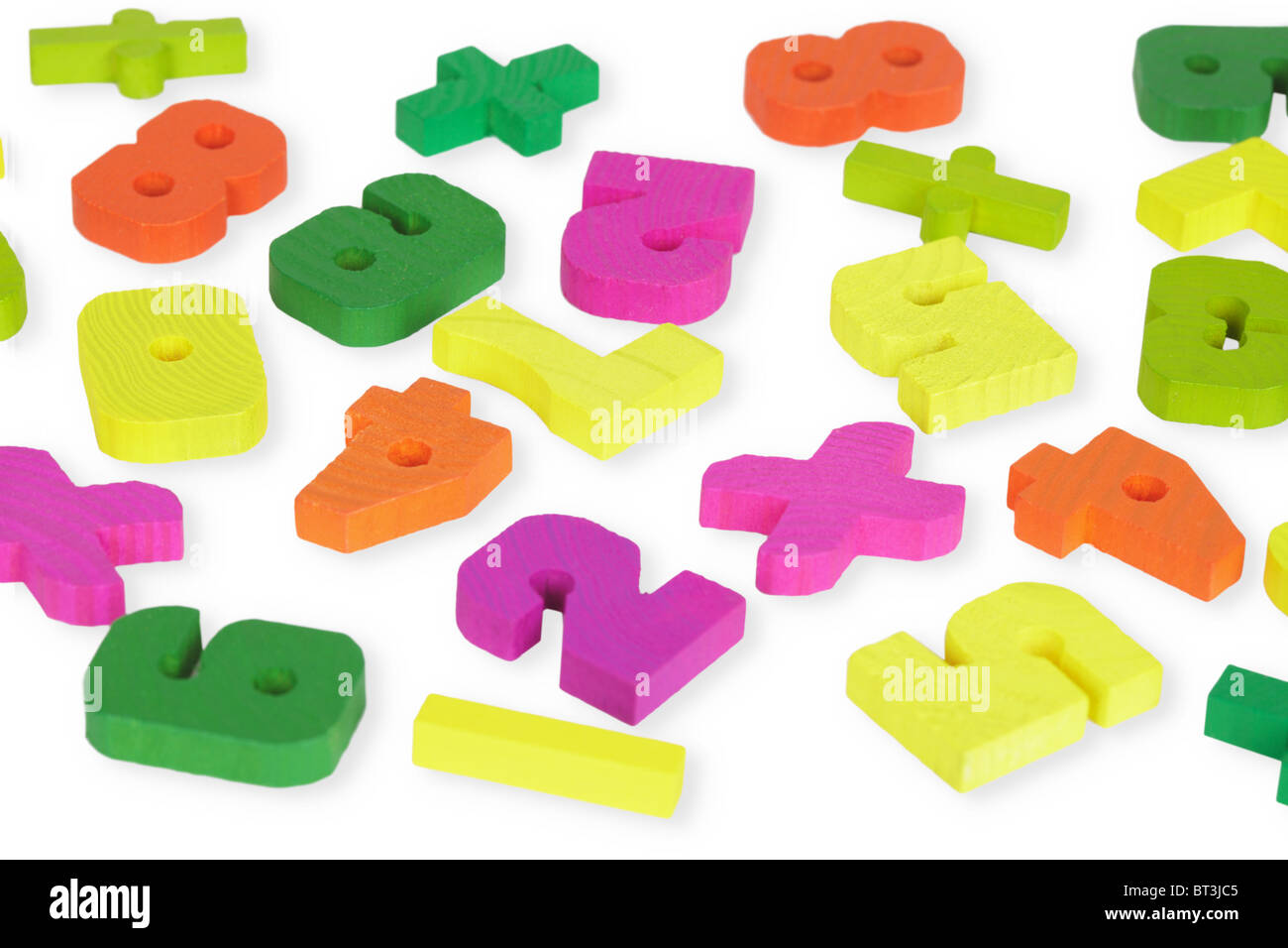 Several multi-colored wooden toy figures isolated on white background ...