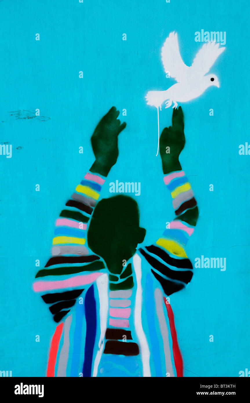 Street Mural of a dove being released, Bermondsey, London, England, UK ...