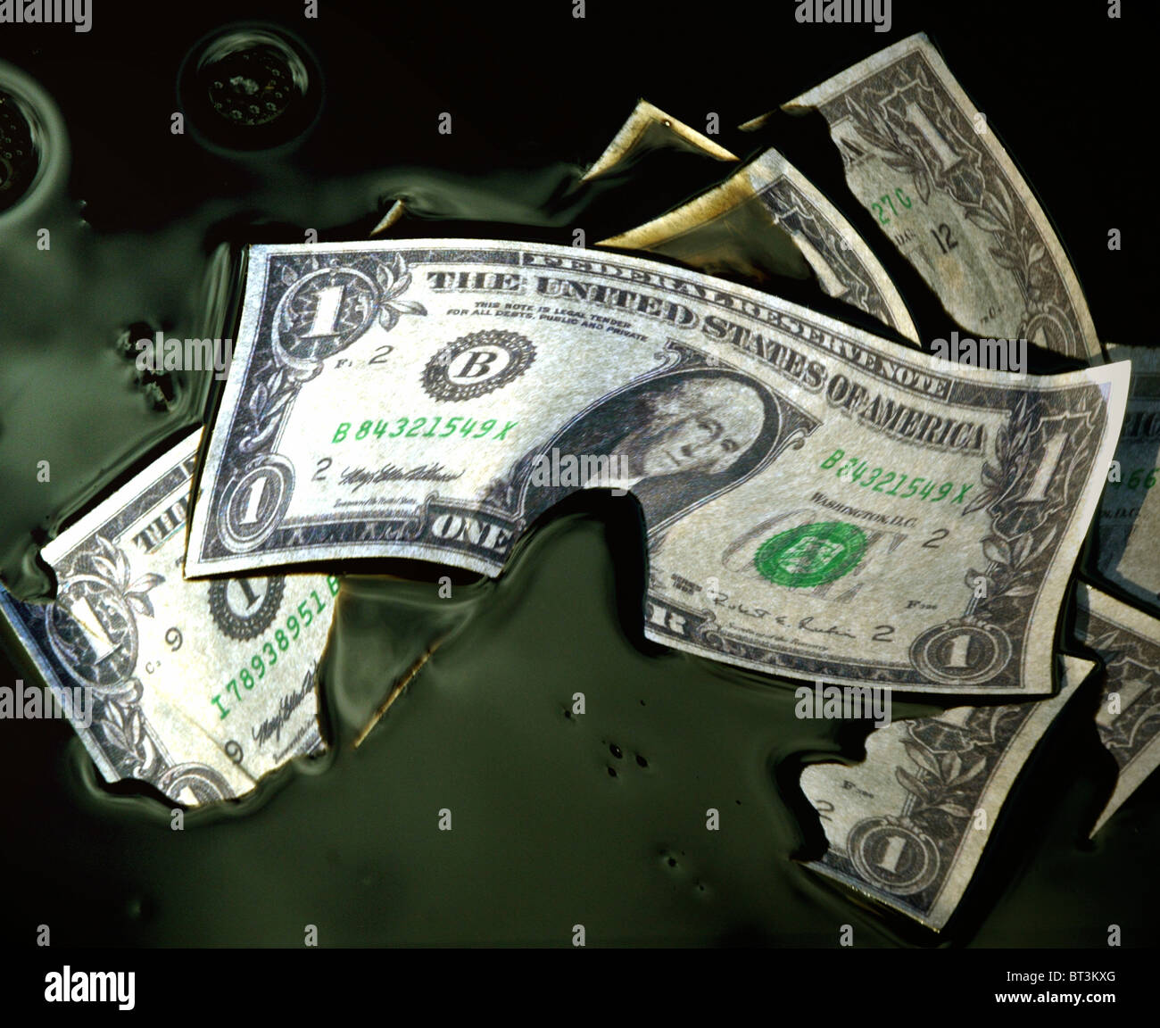 Oil dollars illustration of dirty money Stock Photo - Alamy