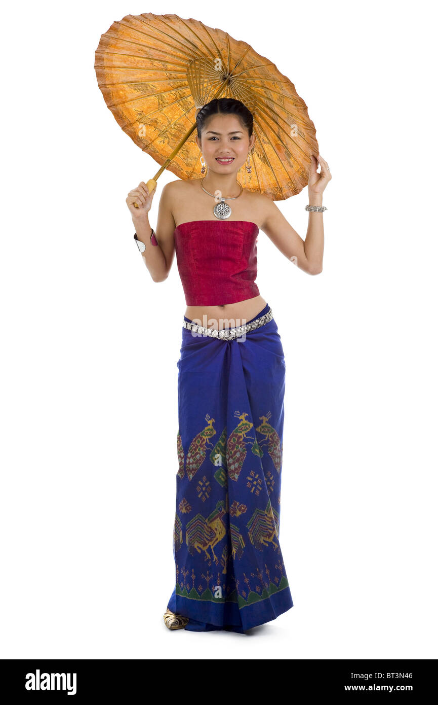 Woman in colorful traditional dress Cut Out Stock Images & Pictures - Alamy