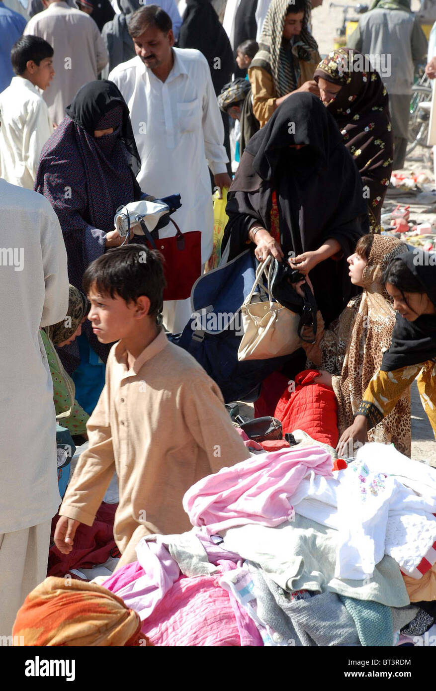 People are shopping at weekly bazaar in Quetta on Sunday, October 17 ...