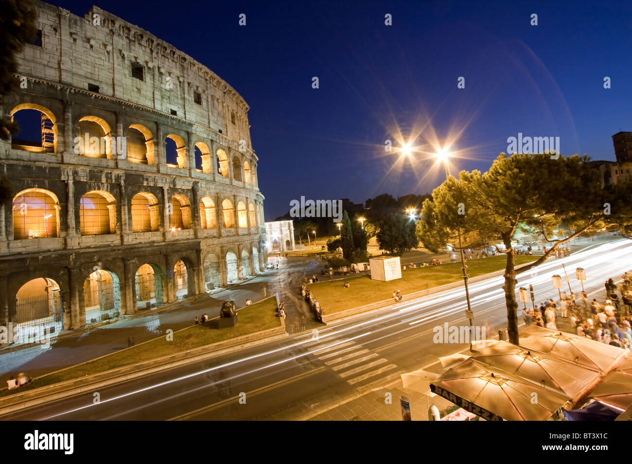 Night view of Colosseum with some traffic light trails. Rome, Italy ...