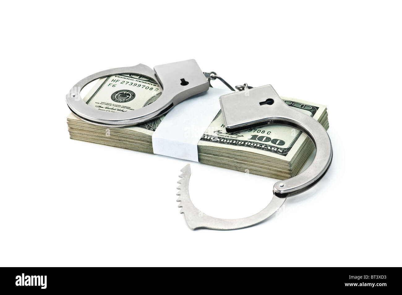 handcuffs and dollars isolated on white Stock Photo - Alamy
