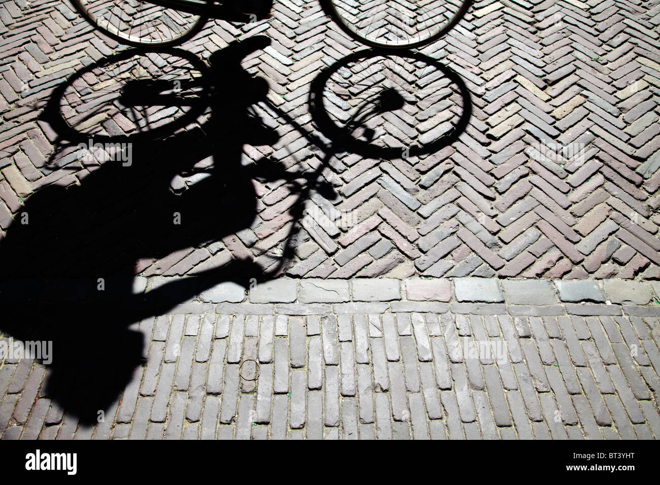 Bicycle shadow hi-res stock photography and images - Alamy