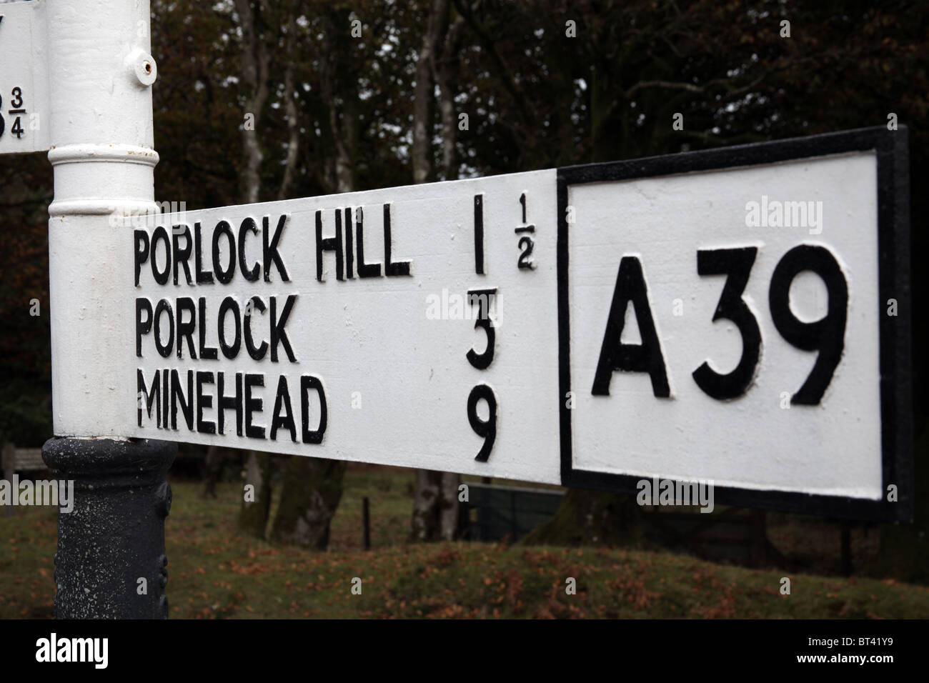 Old fashioned road direction sign, Porlock Hill, Somerset, England ...