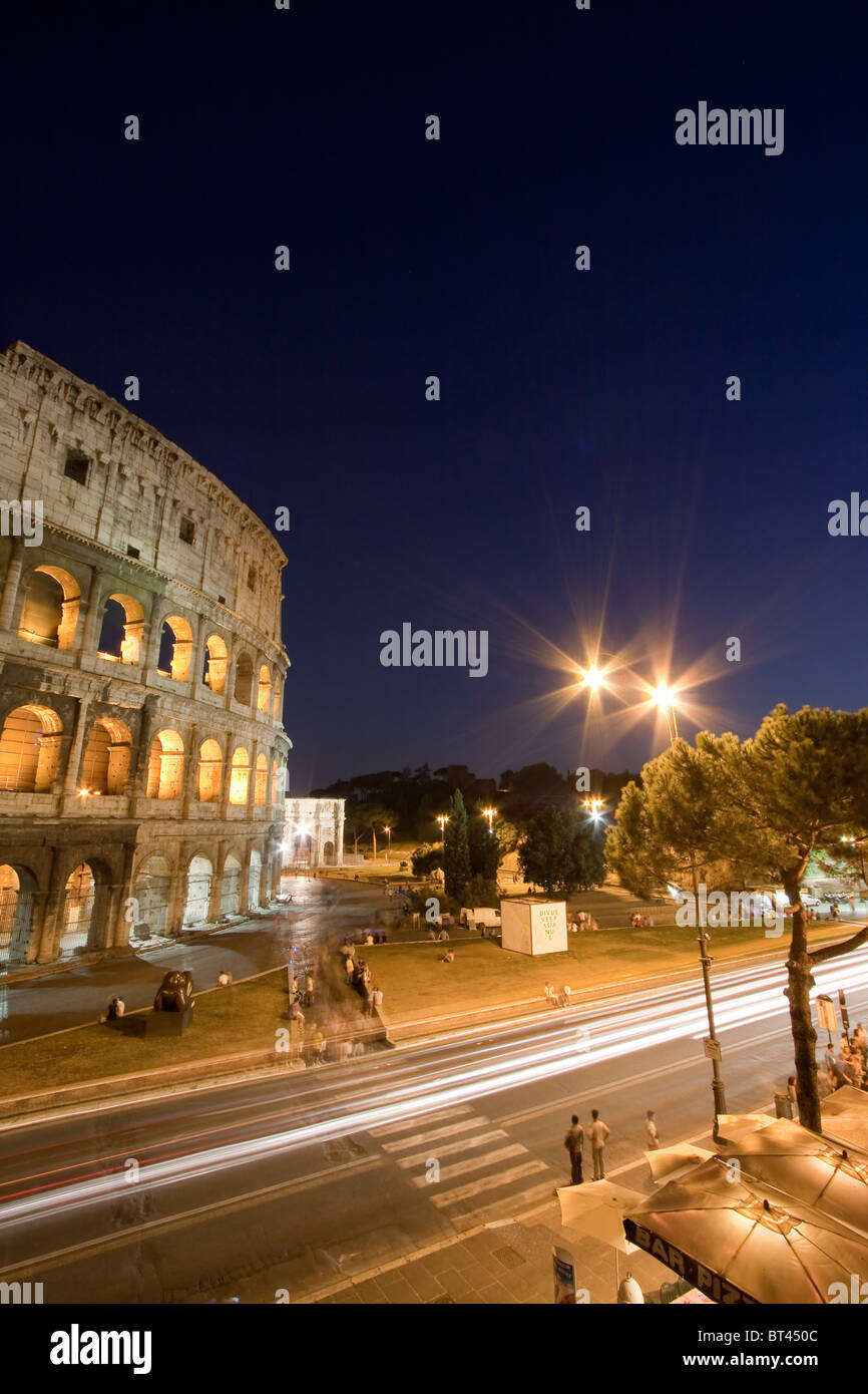 Night view of Colosseum with some traffic light trails. Rome, Italy ...