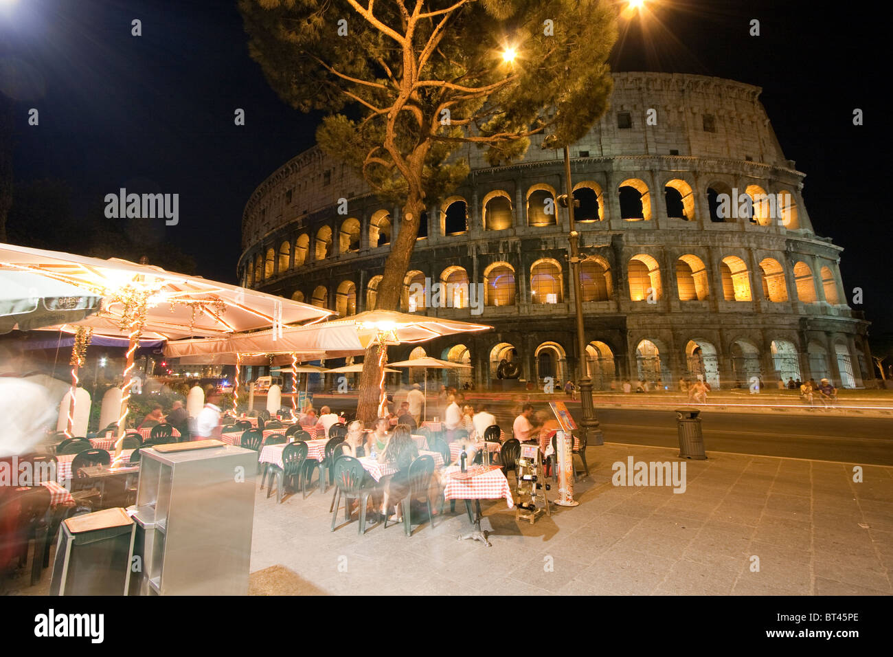 Night view of Colosseum with some traffic light trails. Rome, Italy ...