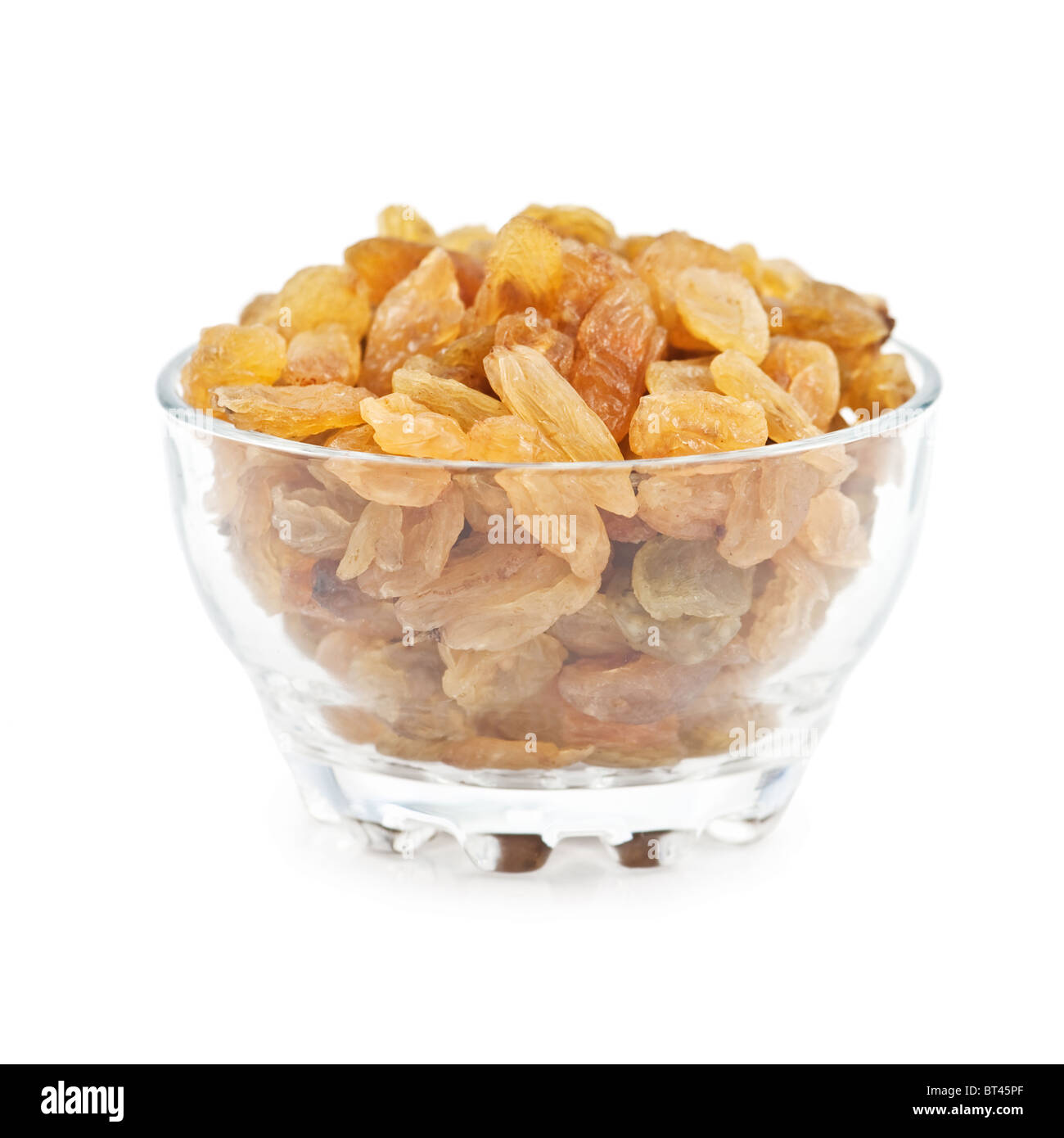 yellow raisin isolated on white Stock Photo - Alamy