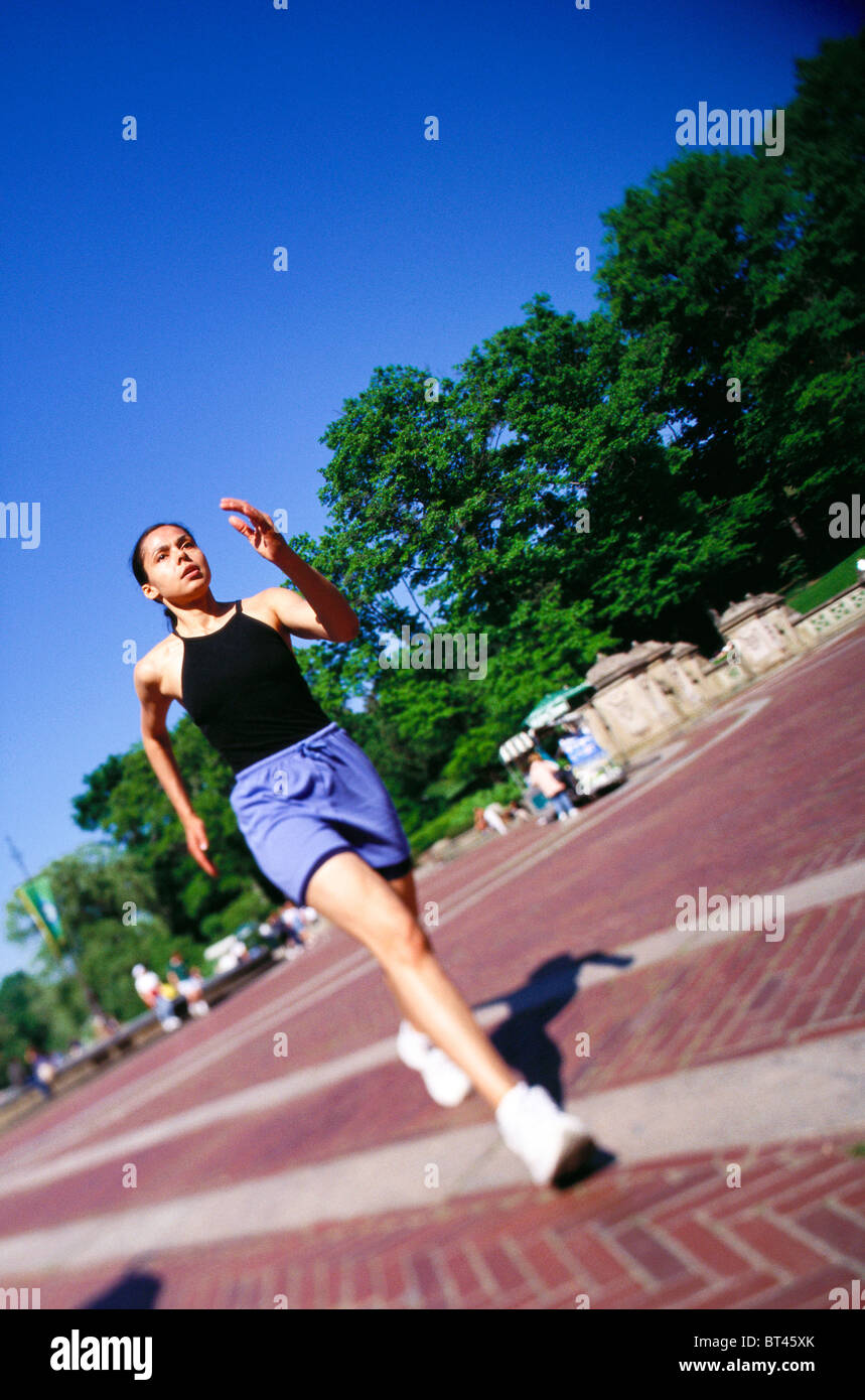 Woman out on a fitness walk Stock Photo - Alamy
