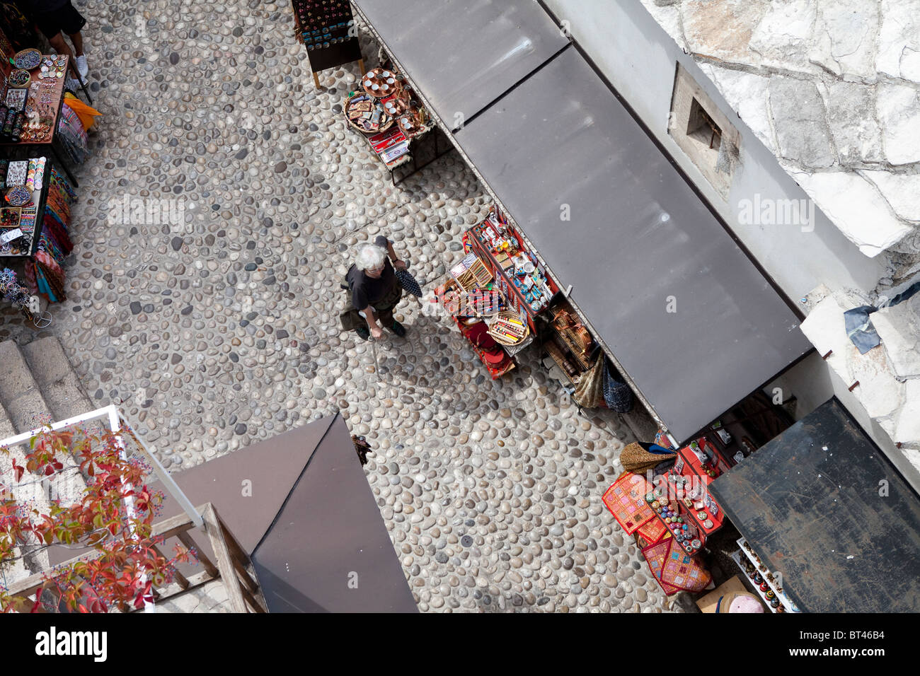 The busy old market bazaar street Kujundziluk in Mostar with lots of ...