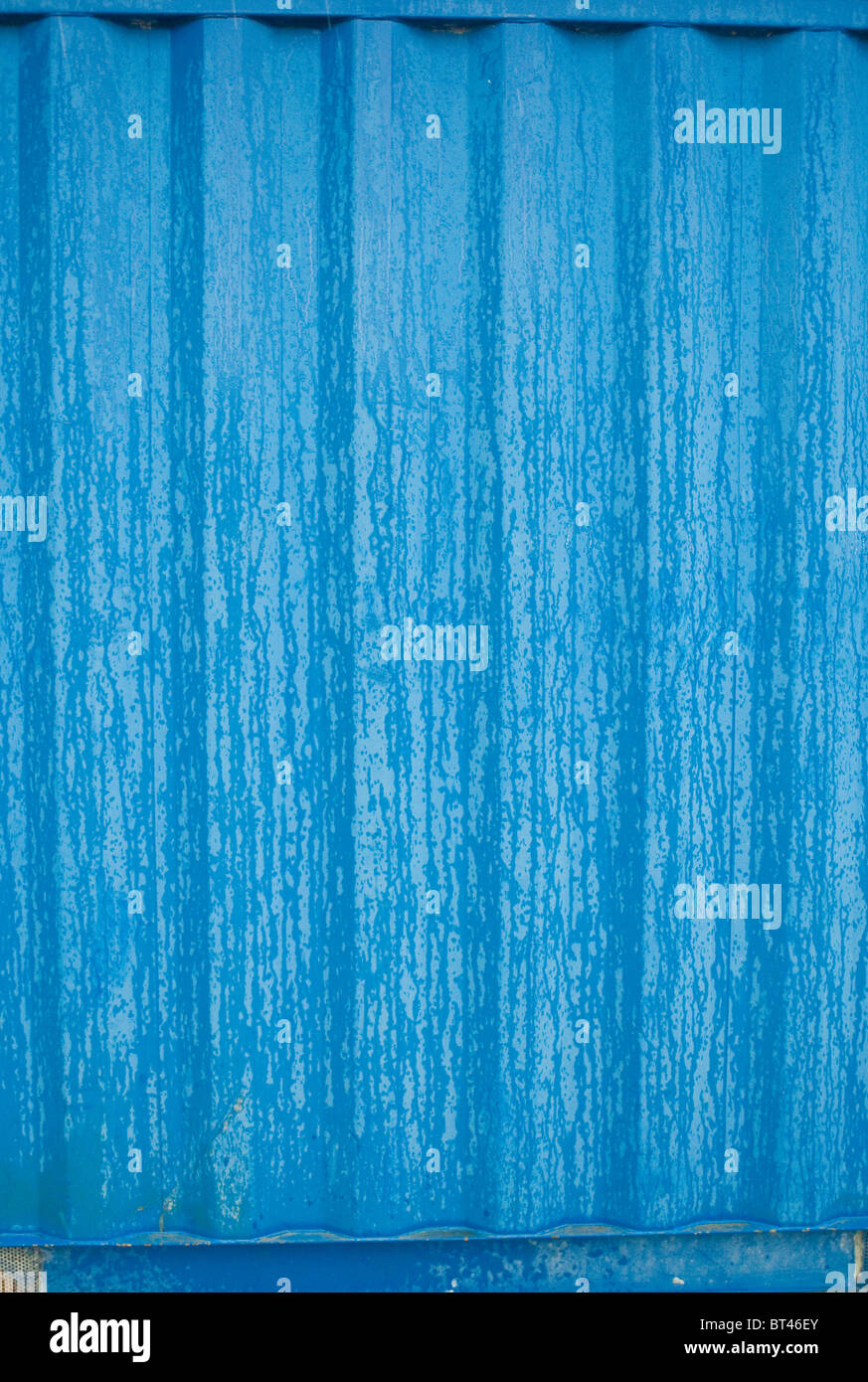 an iron wall painted in blue Stock Photo - Alamy
