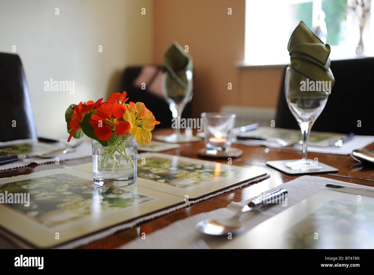 Table laid out in dining room ready for Sunday lunch Stock Photo - Alamy