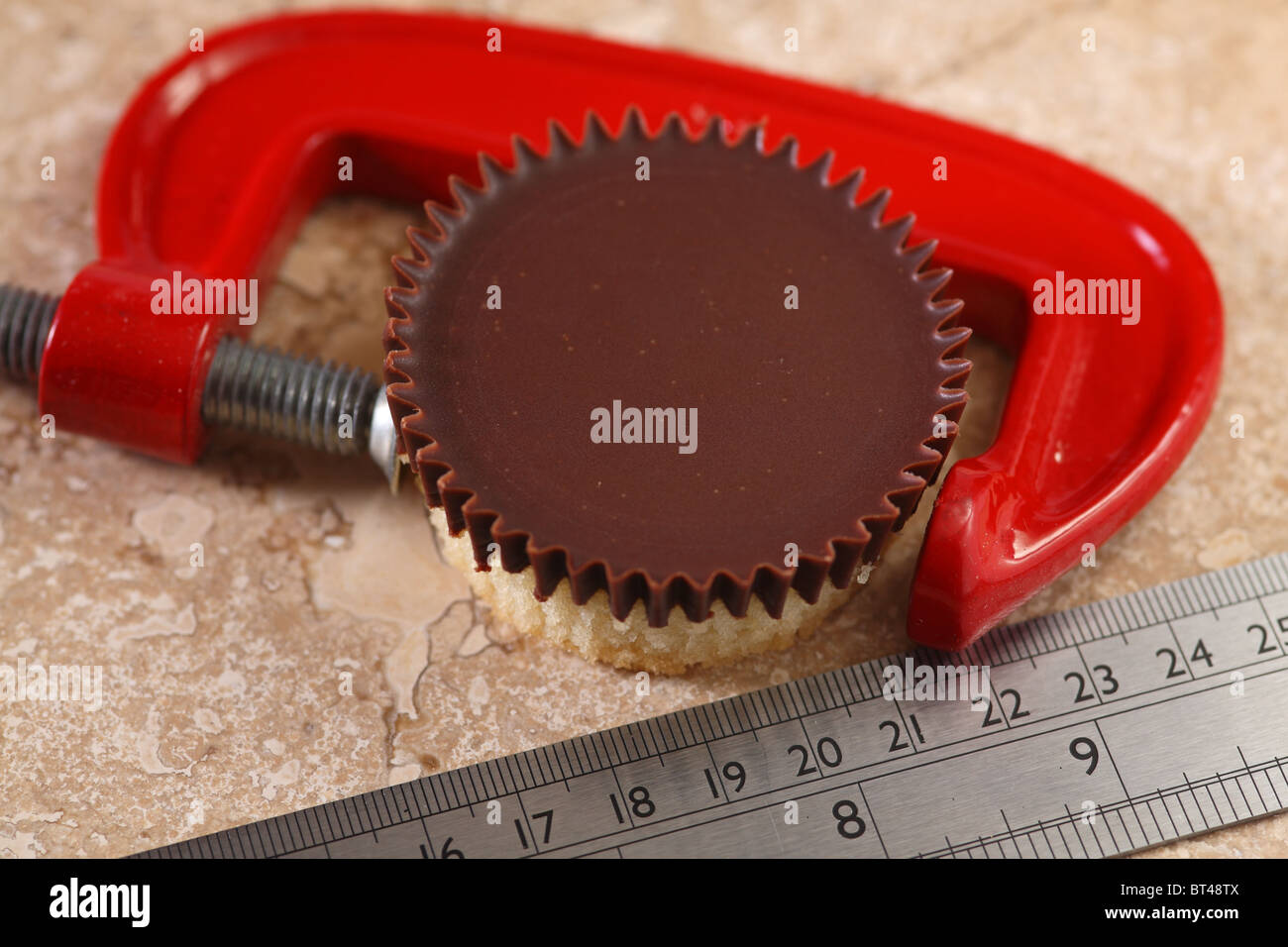 measuring chocolate cup cake Stock Photo - Alamy