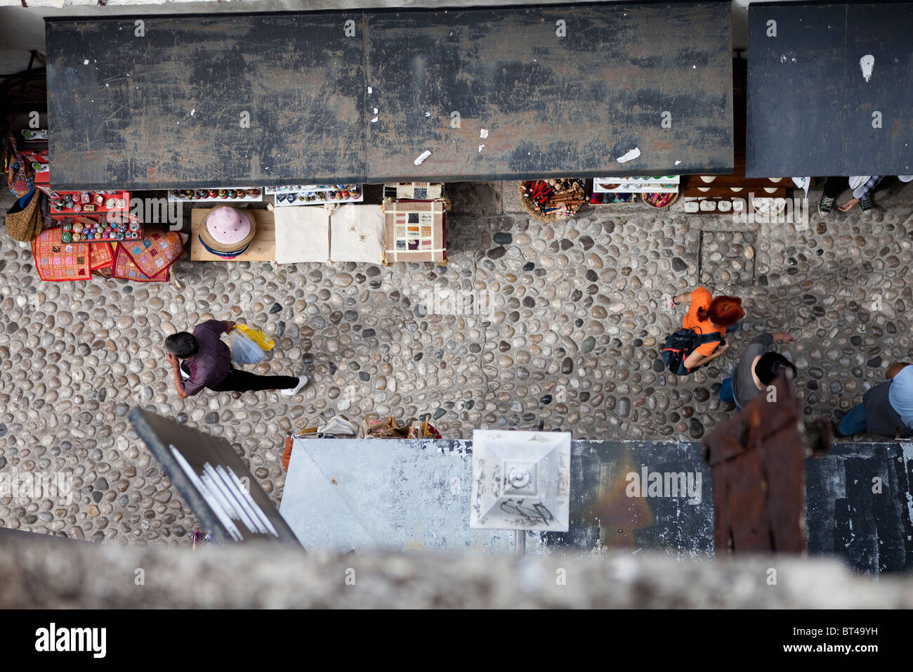 The busy old market bazaar street Kujundziluk in Mostar with lots of ...
